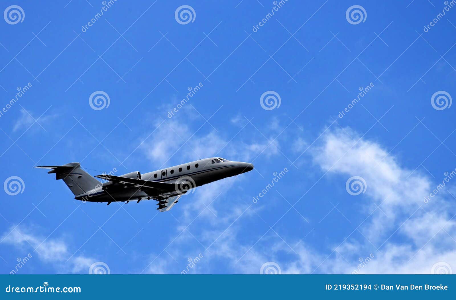 Private Jet Flying with Blue Sky and Clouds Stock Photo - Image of ...