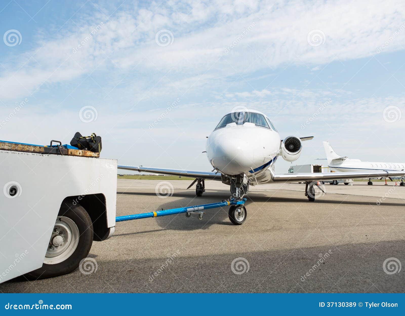 Private Jet Towed by Ground Crew Stock Image - Image of aviation ...