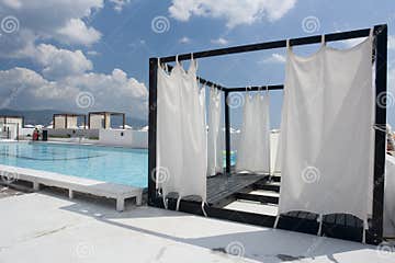 Private tent beside pool stock image. Image of water, framework - 3008343
