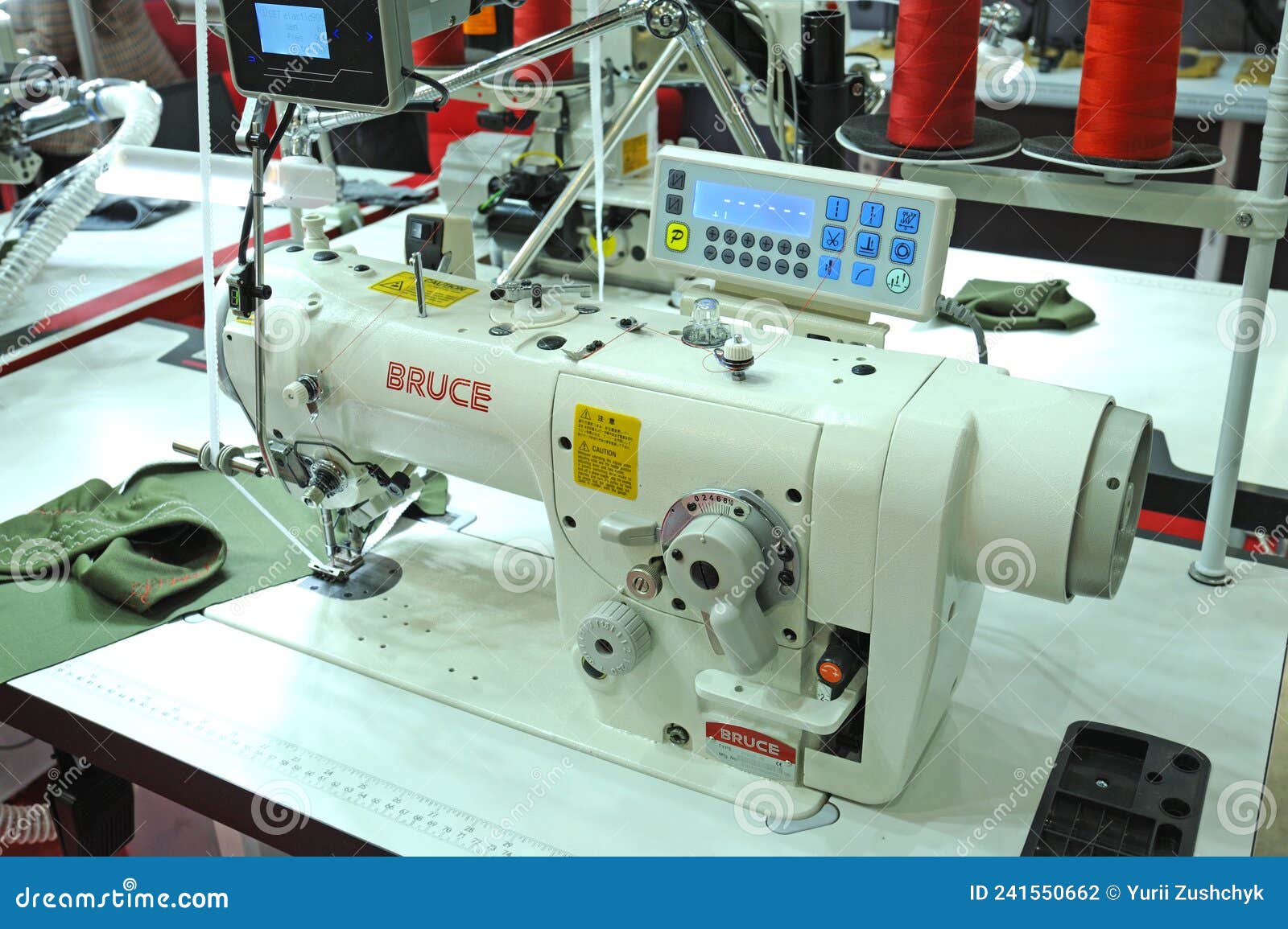 Pro Electric Sewing Machine Bruce Working on a Worktable at the ...