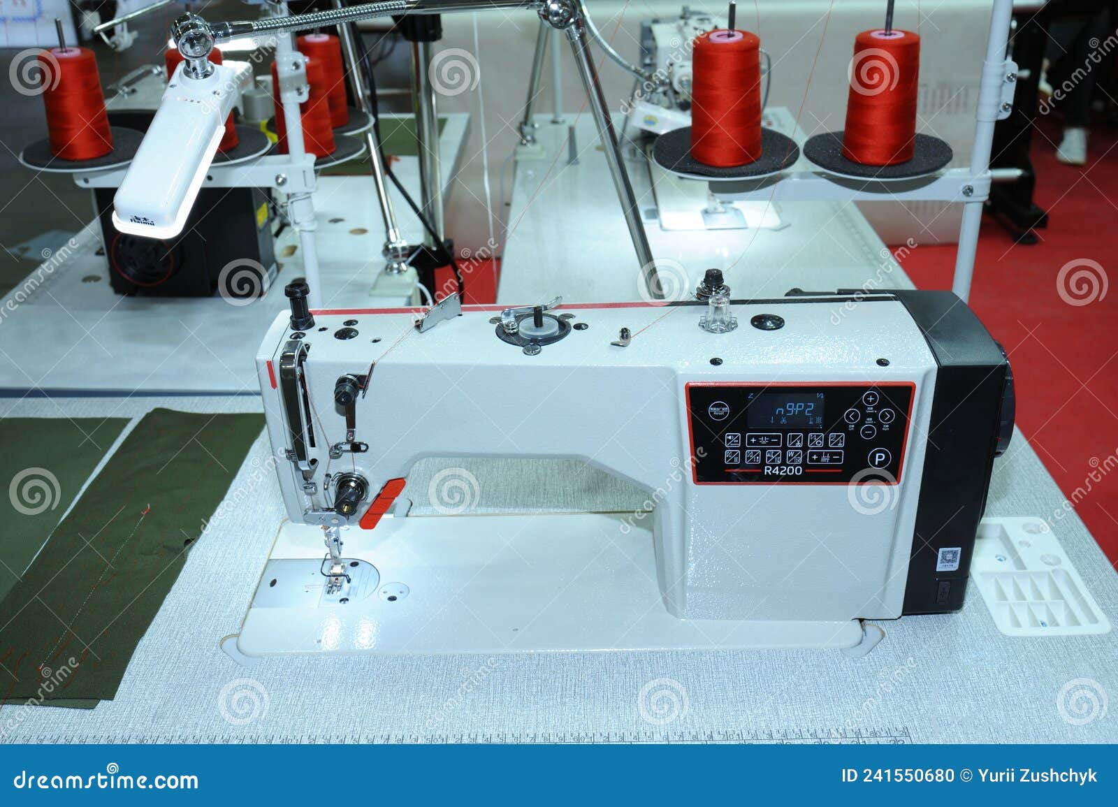 Pro Electric Sewing Machine Bruce Working on a Worktable at the ...