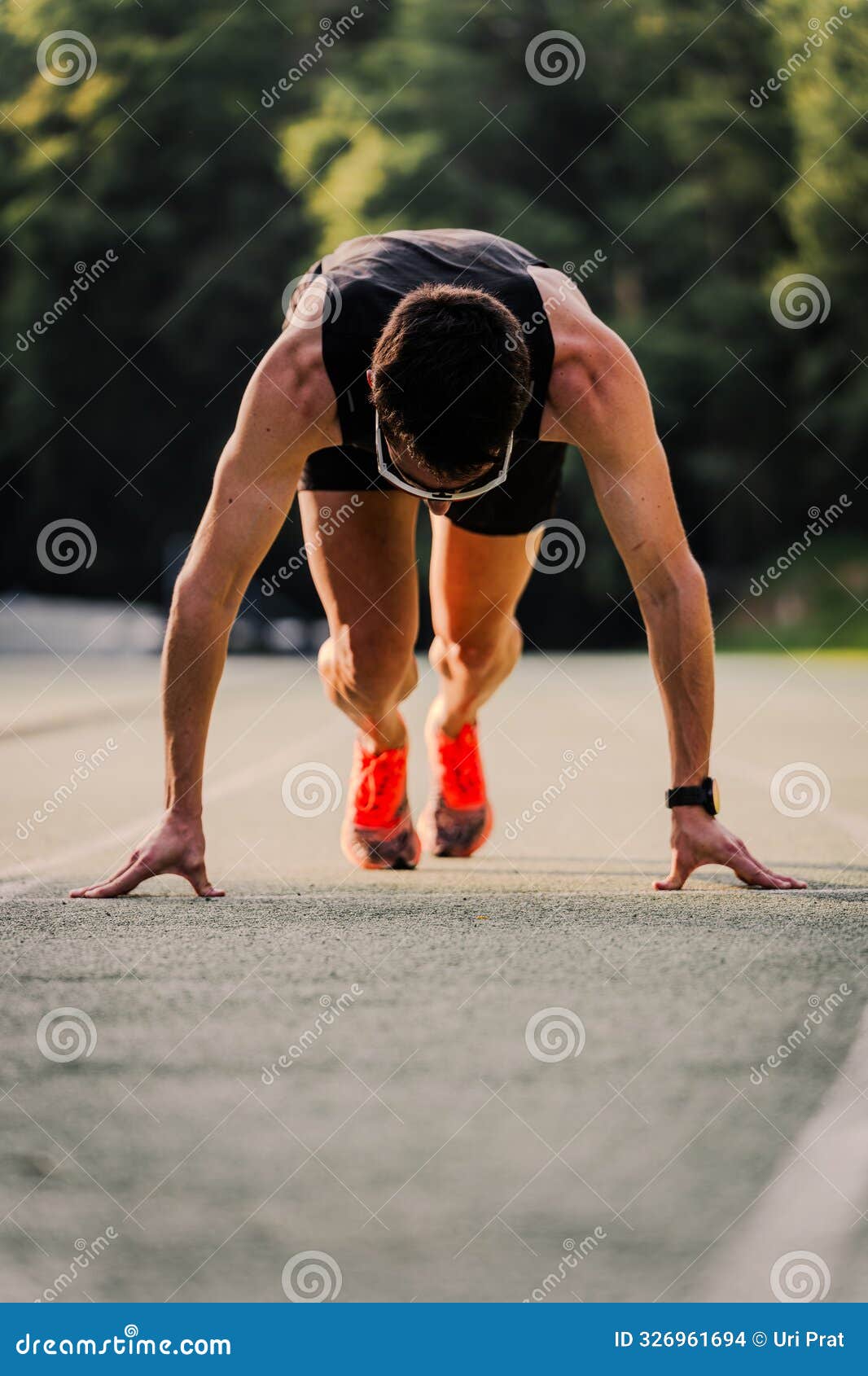 Pro Runner Ready To Go during the Race on the Running Track. Vertical ...