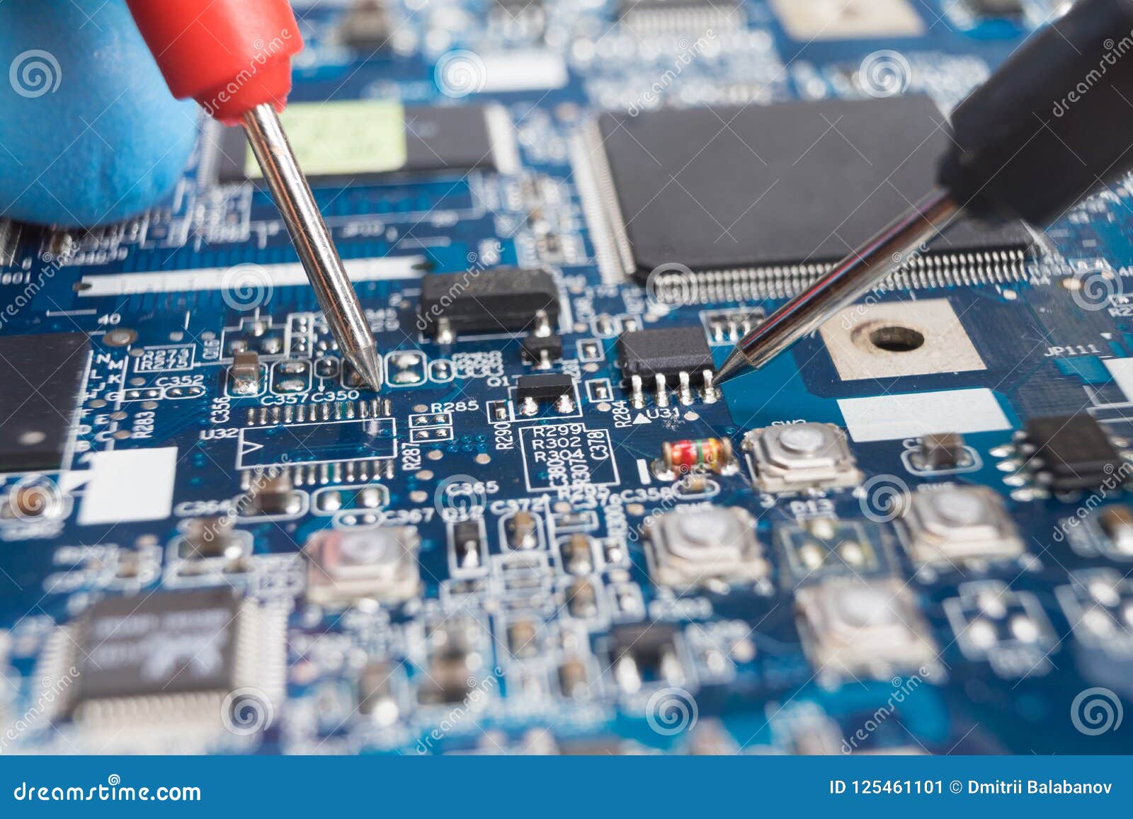 The Probes of the Tester Touch the Terminals of the Chip. Computer ...