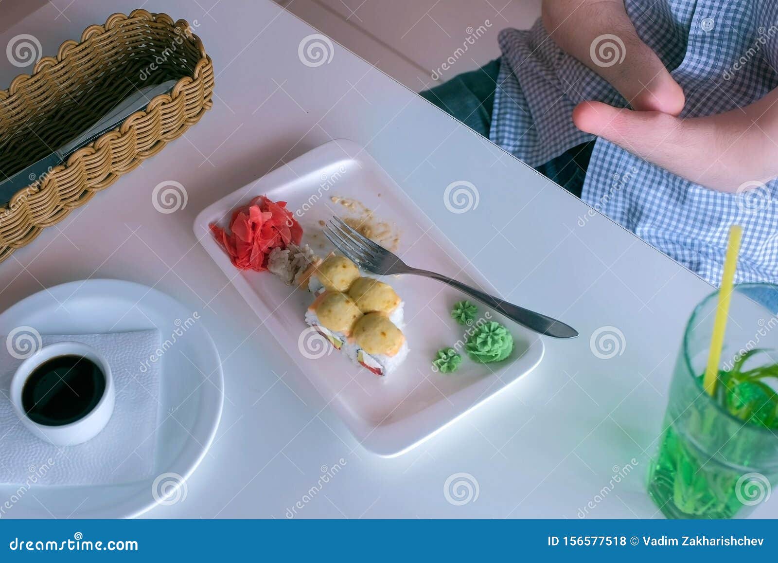 Disabled Man with Two Amputated Stump Hands Eats Sushi Rolls in Cafe ...