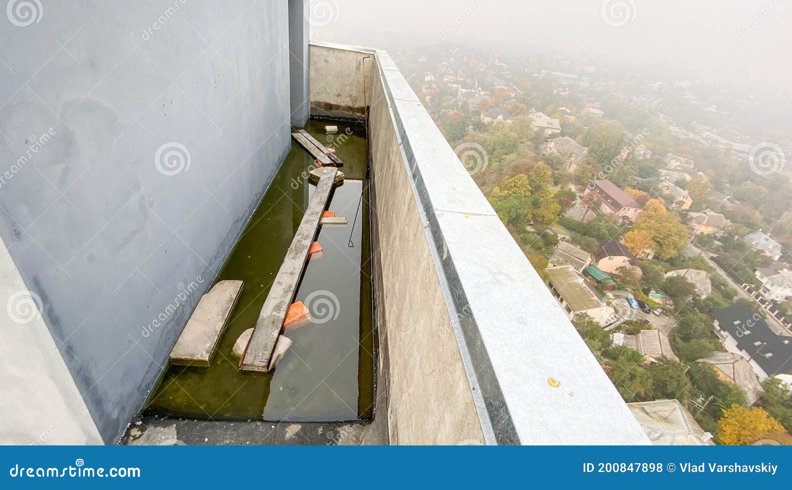 The Problem Of Drainage On The Roof Of A New Building. Flooded Exit To ...
