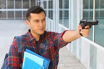 Problematic Student Holding a Gun Stock Photo - Image of arcade ...