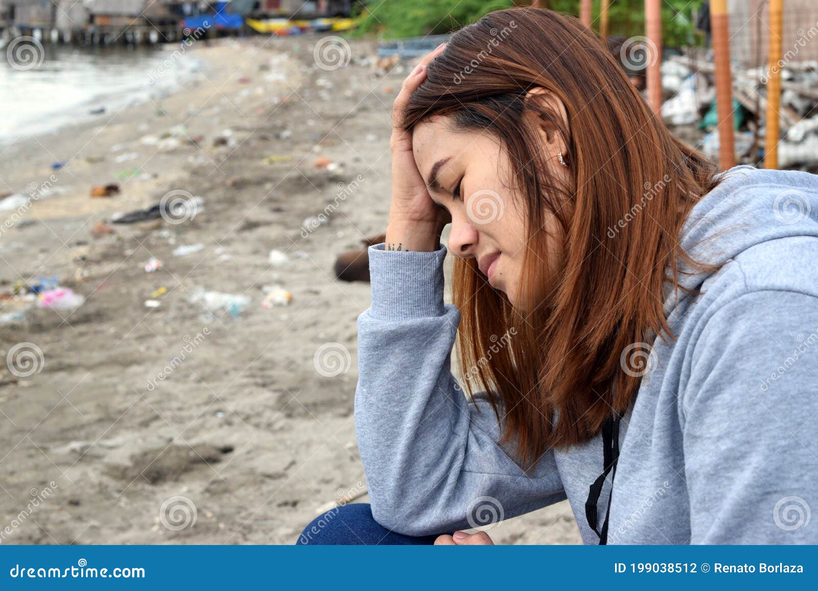 Problematic Woman Standing by Dirty Sea Shore Staring at the Sea. Stock ...