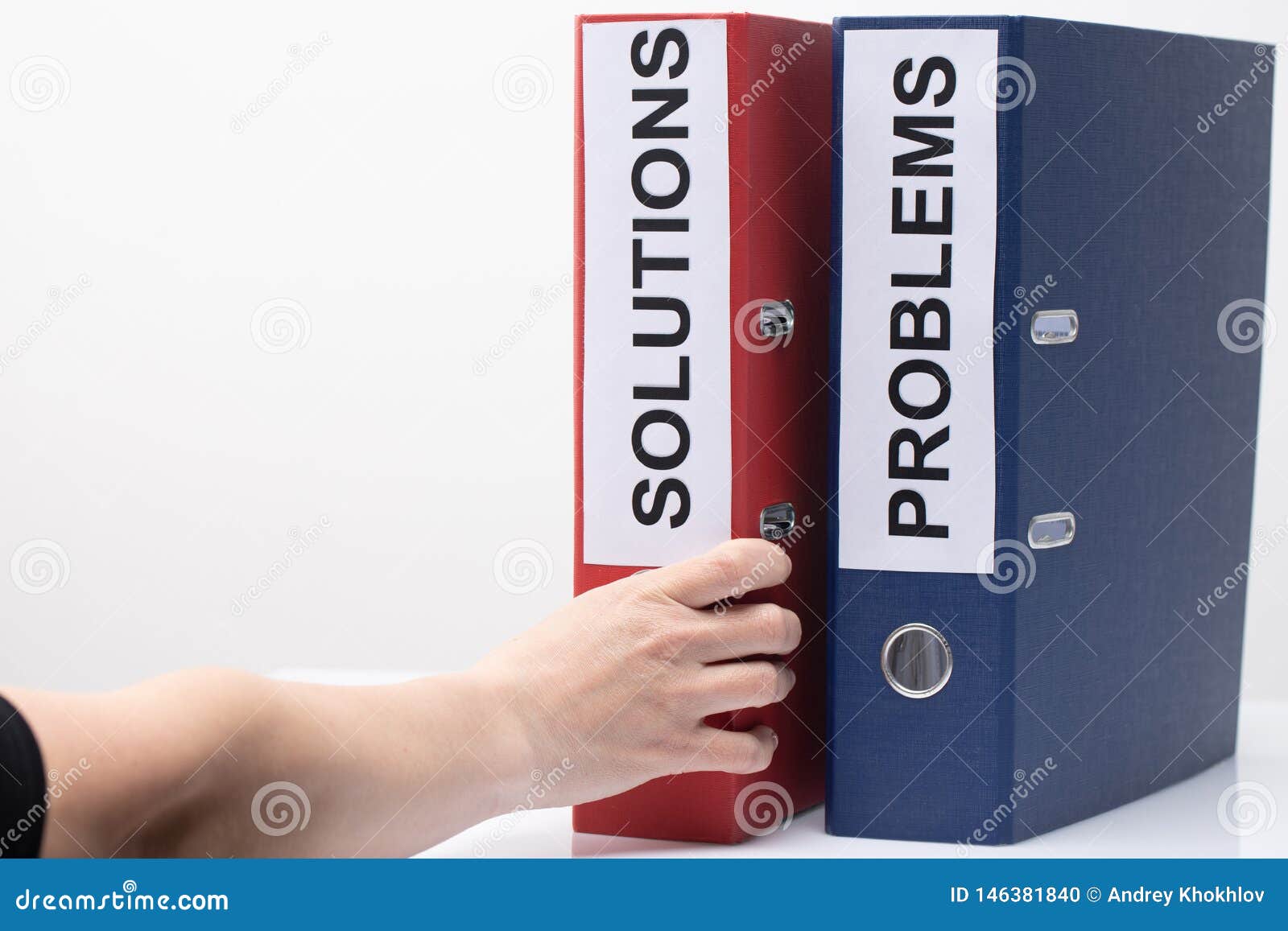 Problems and Solutions - Two Binders with Text on Desk in the Office ...