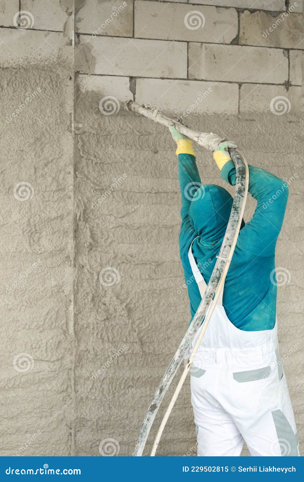 The Process of Applying Plaster To Walls Inside a Building by Machine ...