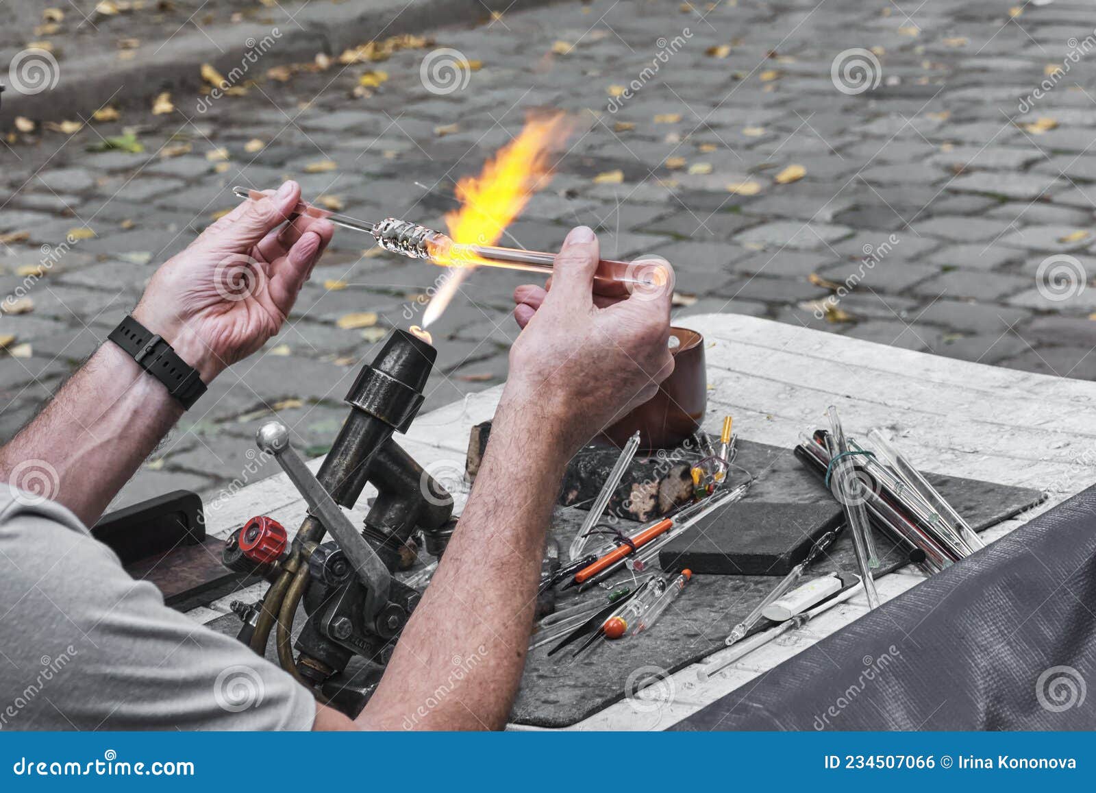 Process of Artistic Glass Processing by Burner Flame. Hands of Mature ...