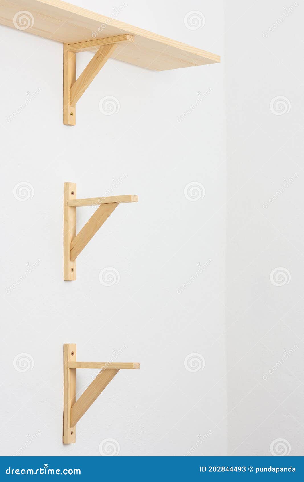 The Process of Attaching a Wooden Shelf To the Wall Stock Image - Image ...
