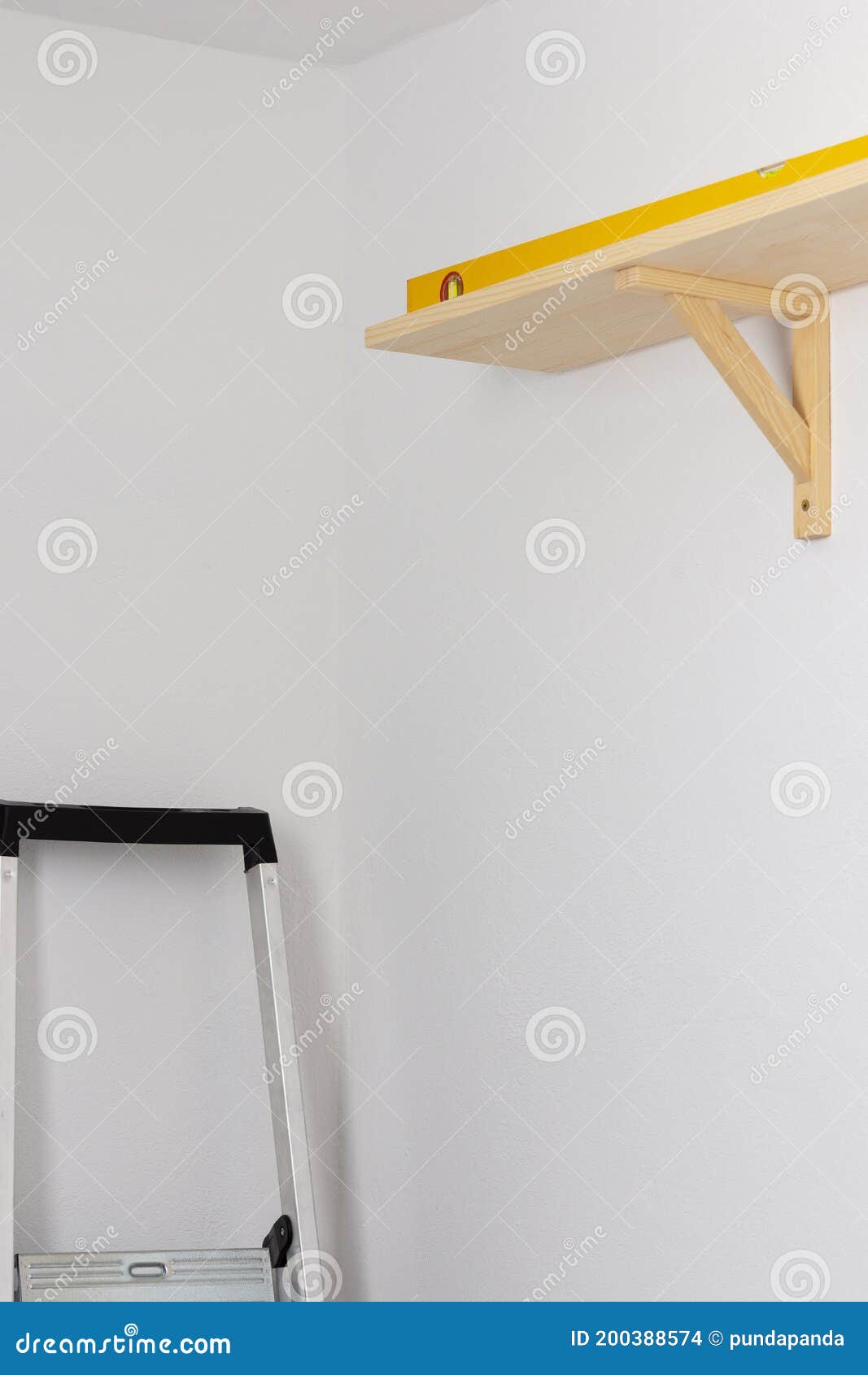 The Process of Attaching a Wooden Shelf To the Wall Stock Photo - Image ...