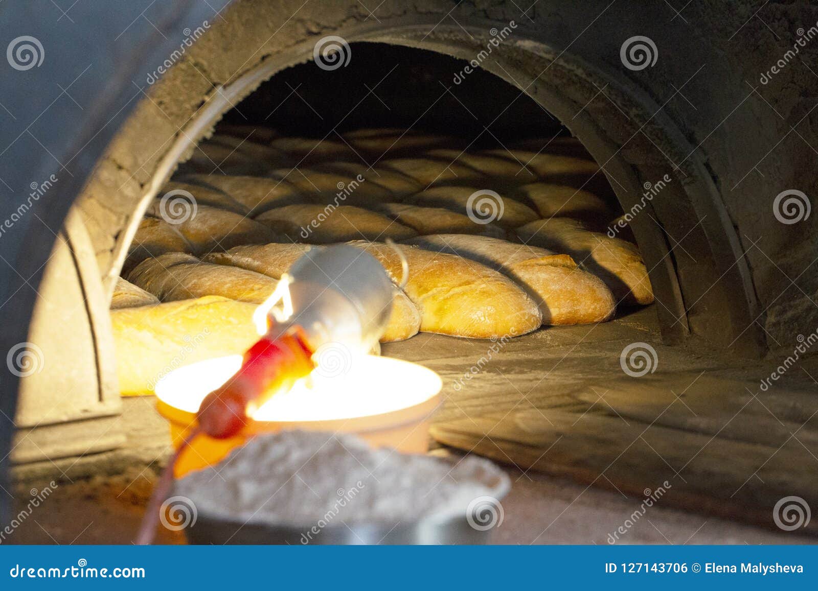 The Process of Baking Bread in the Old Traditional Oven Stock Photo ...