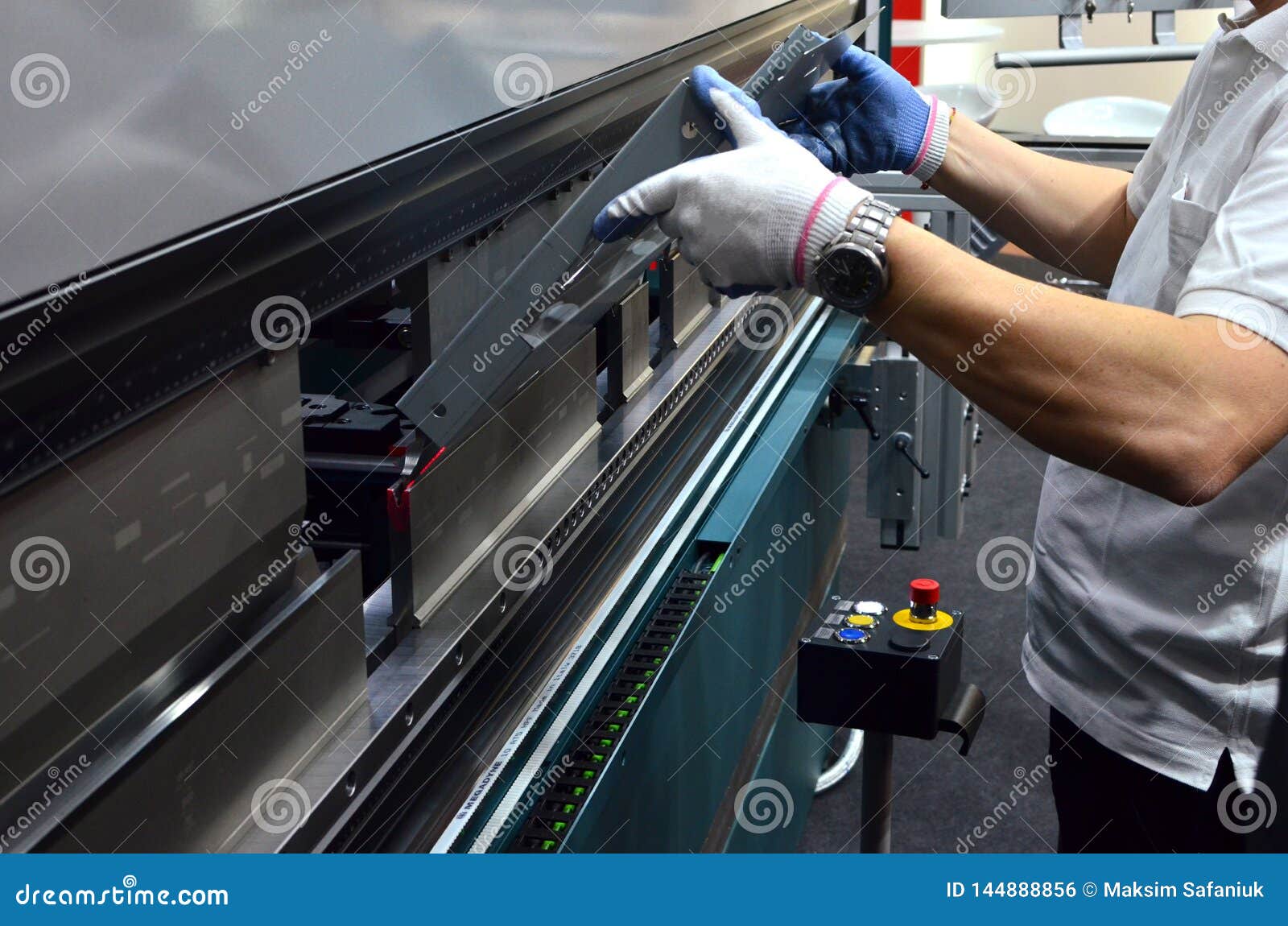 The Process of Bending Sheet Metal on a Sheet Bending Machine Stock ...