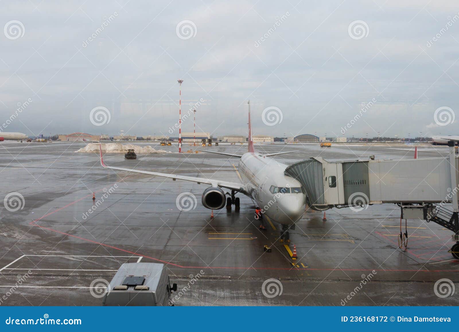The Process of Boarding Passengers on the Plane. Aerodrome Stock Photo ...