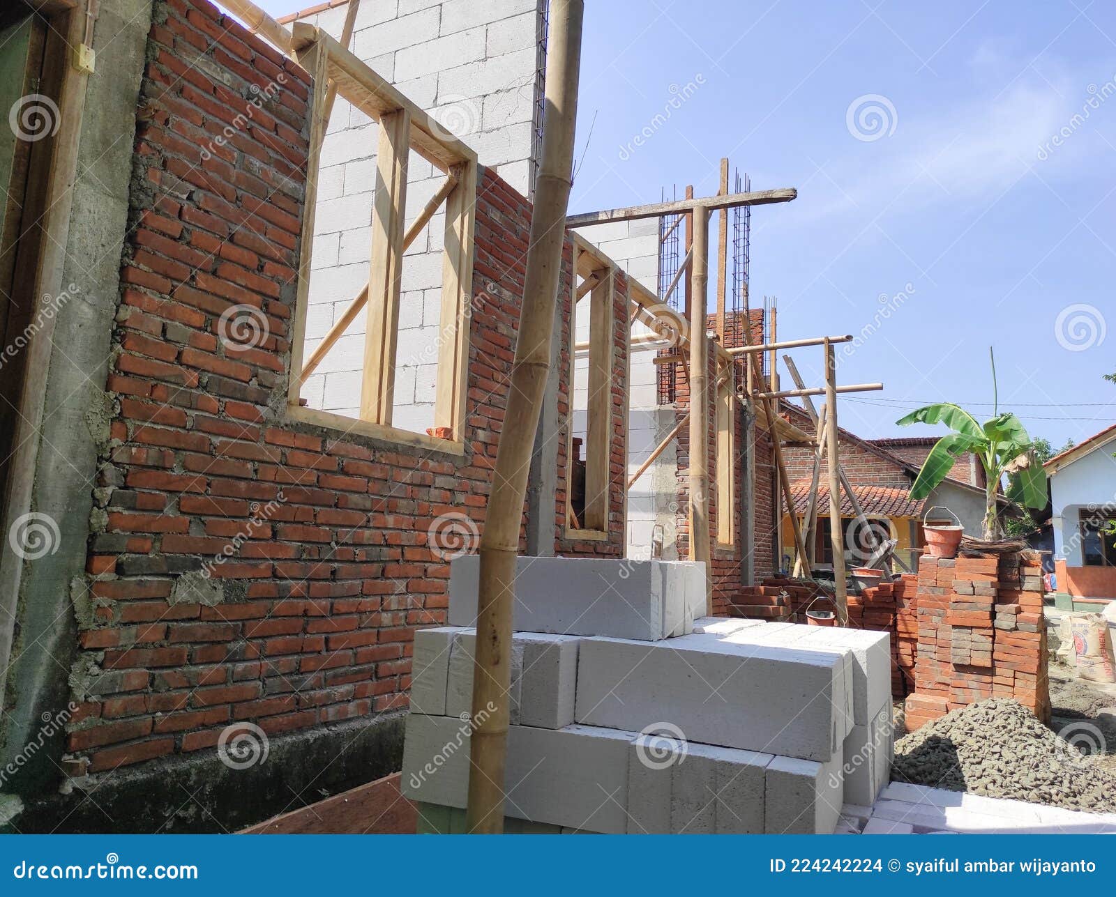 The Process of Building a House with Red Brick Stock Photo - Image of ...