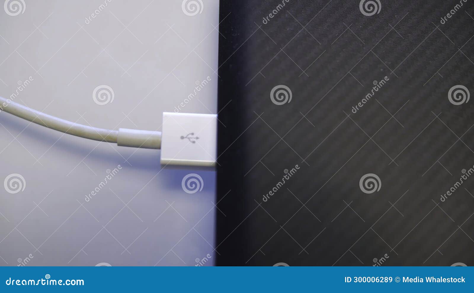 Process of Charging Device with a White USB Cable. Media. Close Up of ...