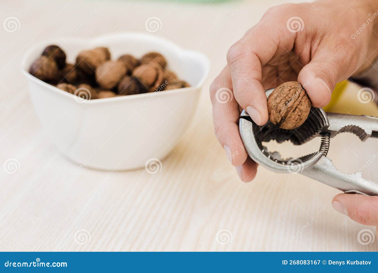 Cracking nuts concept stock image. Image of nutshell - 268083167