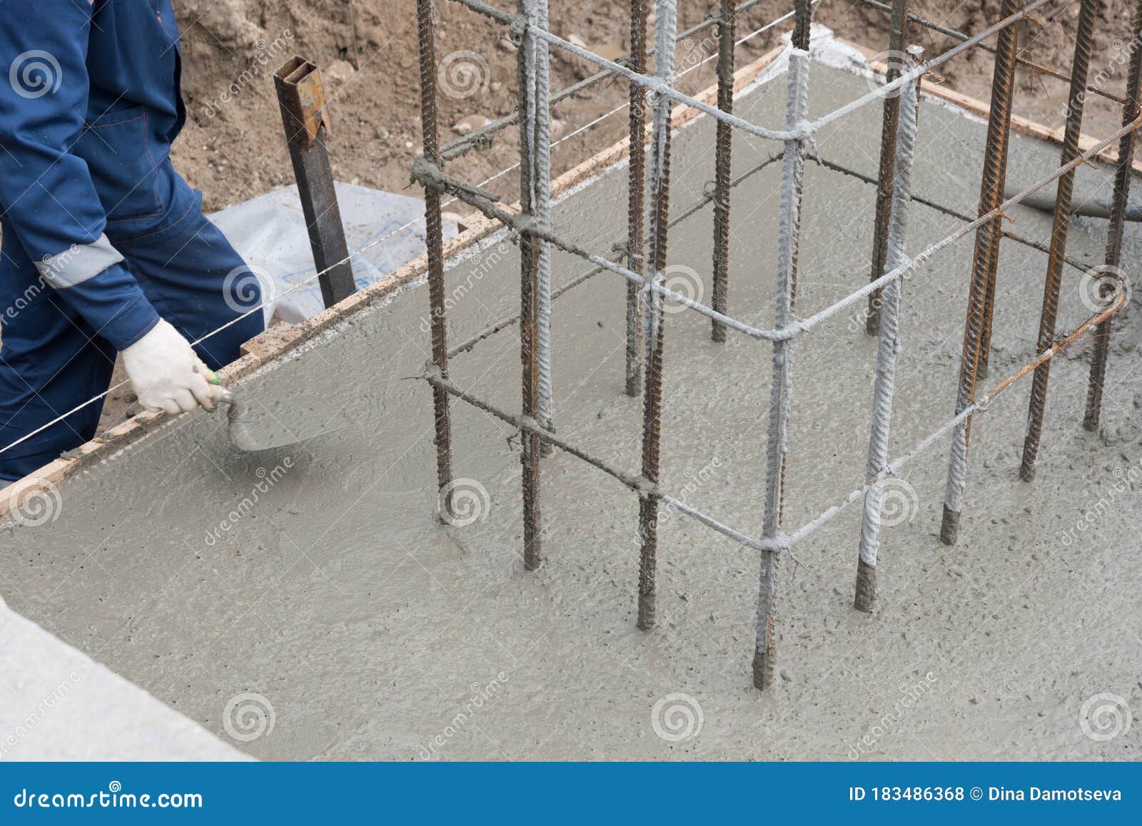 The Process of Compacting and Smoothing Fresh Concrete. Concrete is ...