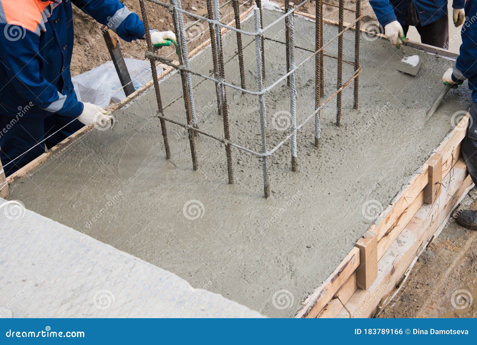 The Process of Compacting and Smoothing Fresh Concrete. Concrete is ...