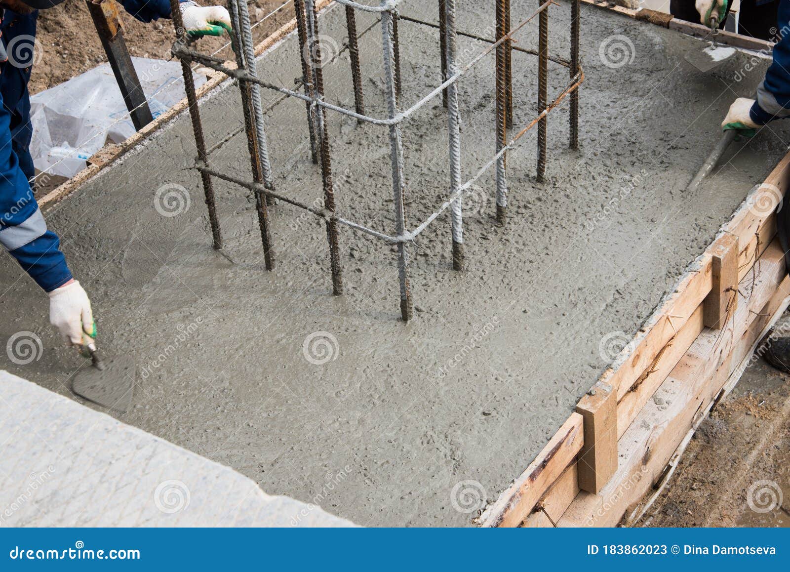 The Process of Compacting and Smoothing Fresh Concrete. Concrete is ...
