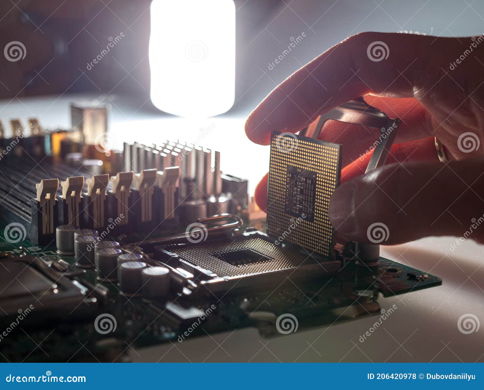 The Process of Connecting the CPU To the Processor Socket on a Modern Computer Motherboard ...