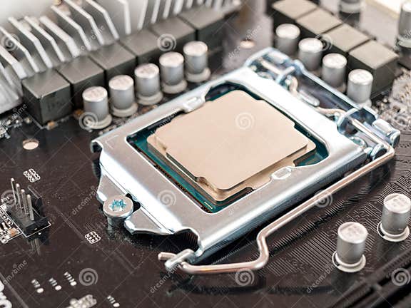 The Process of Connecting the CPU To the Processor Socket on a Modern Computer Motherboard ...