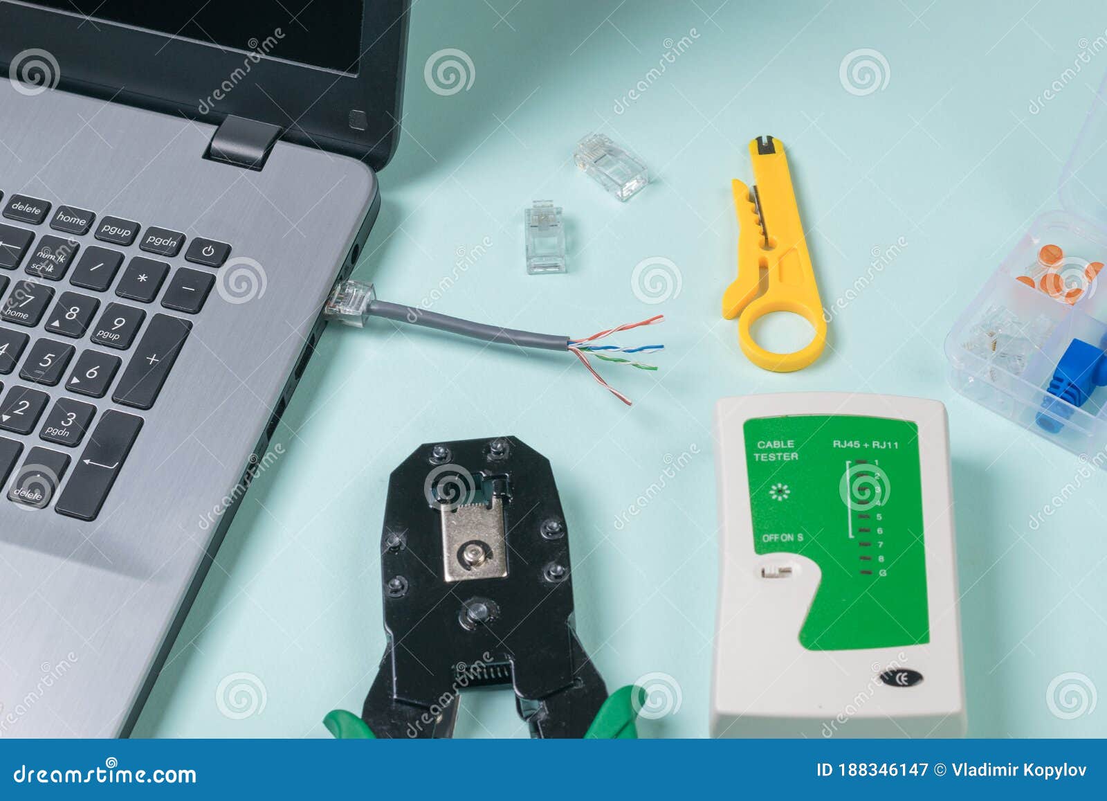 The Process of Connecting an Rj 45 Cable To a Laptop. Stock Image ...