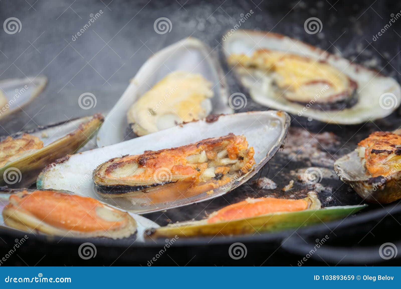 The Process of Cooking Fried Mussels in a Frying Pan Stock Image ...