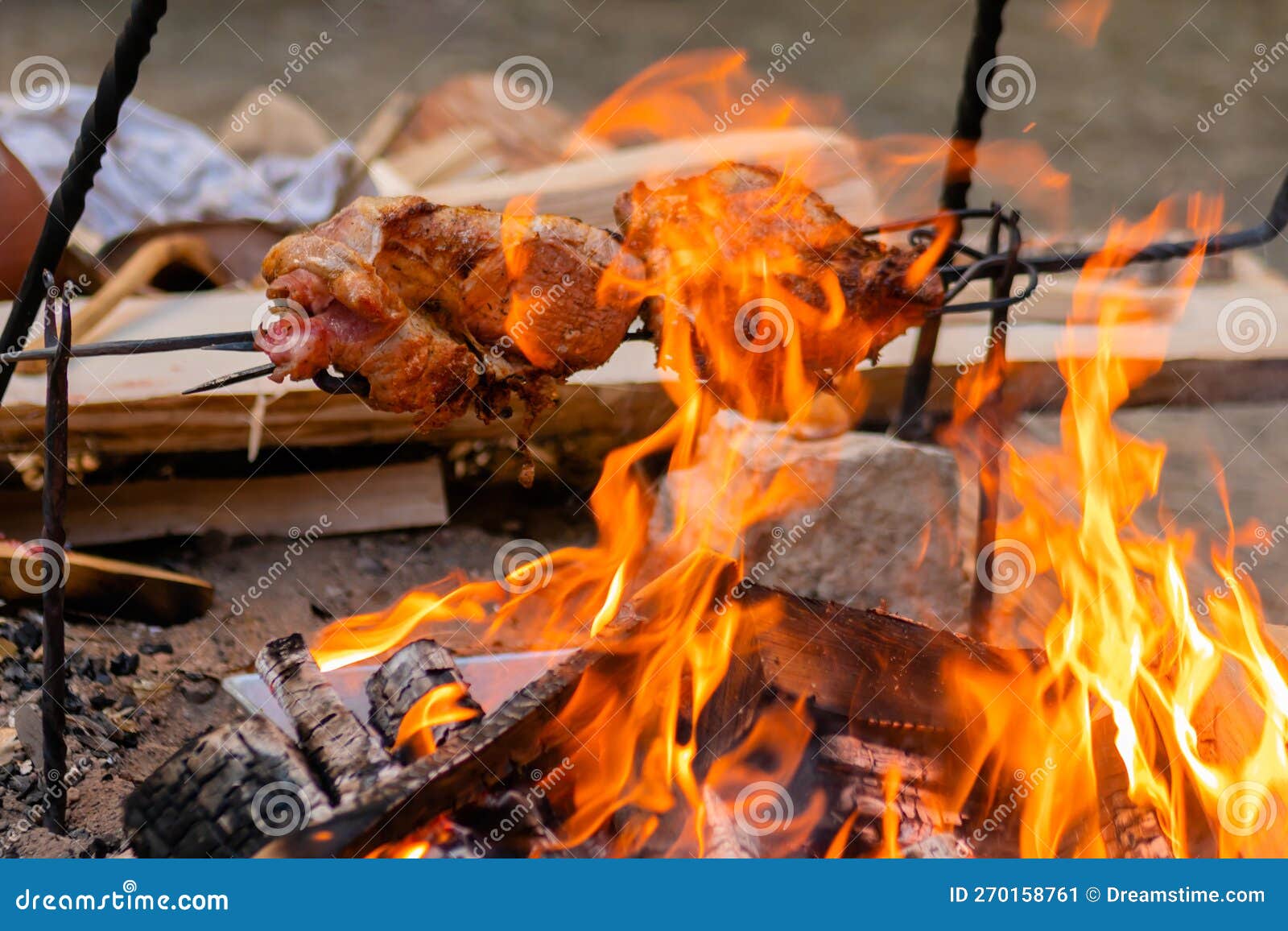Process of Cooking Large Meat Peaces on Spit Over Open Fire Stock Image ...