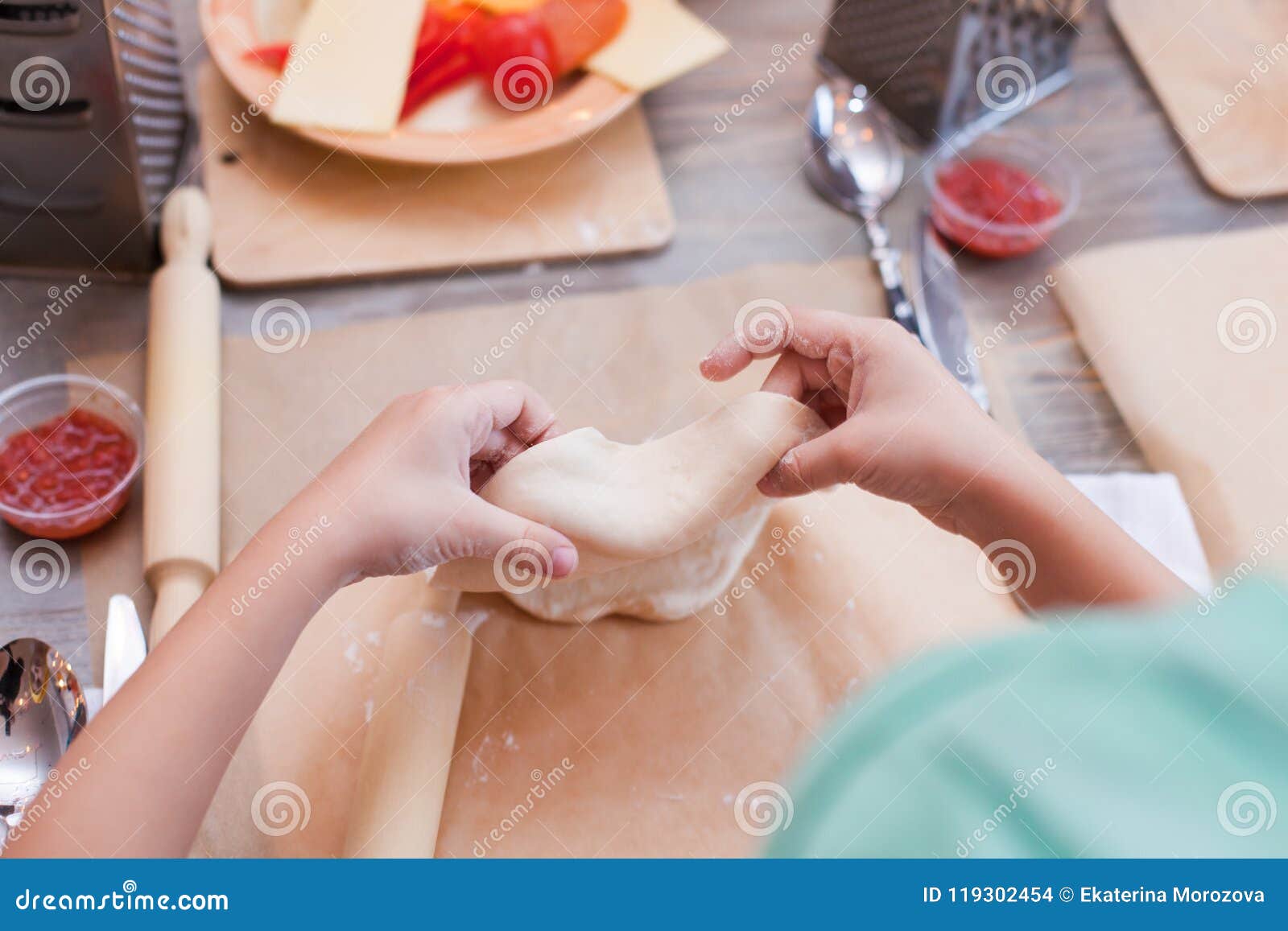 The Process of Cooking Pizza, the Child Works with a Pizza Test, a ...