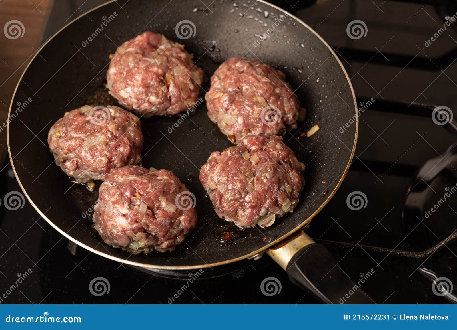 The Process of Cooking and Roasting Beef Meat Cutlets in a Frying Pan ...