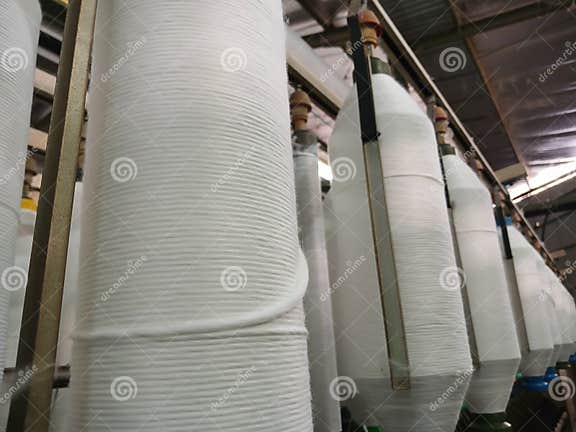 Process of Cotton into Yarn on a Spinning Machine in the Textile Stock ...