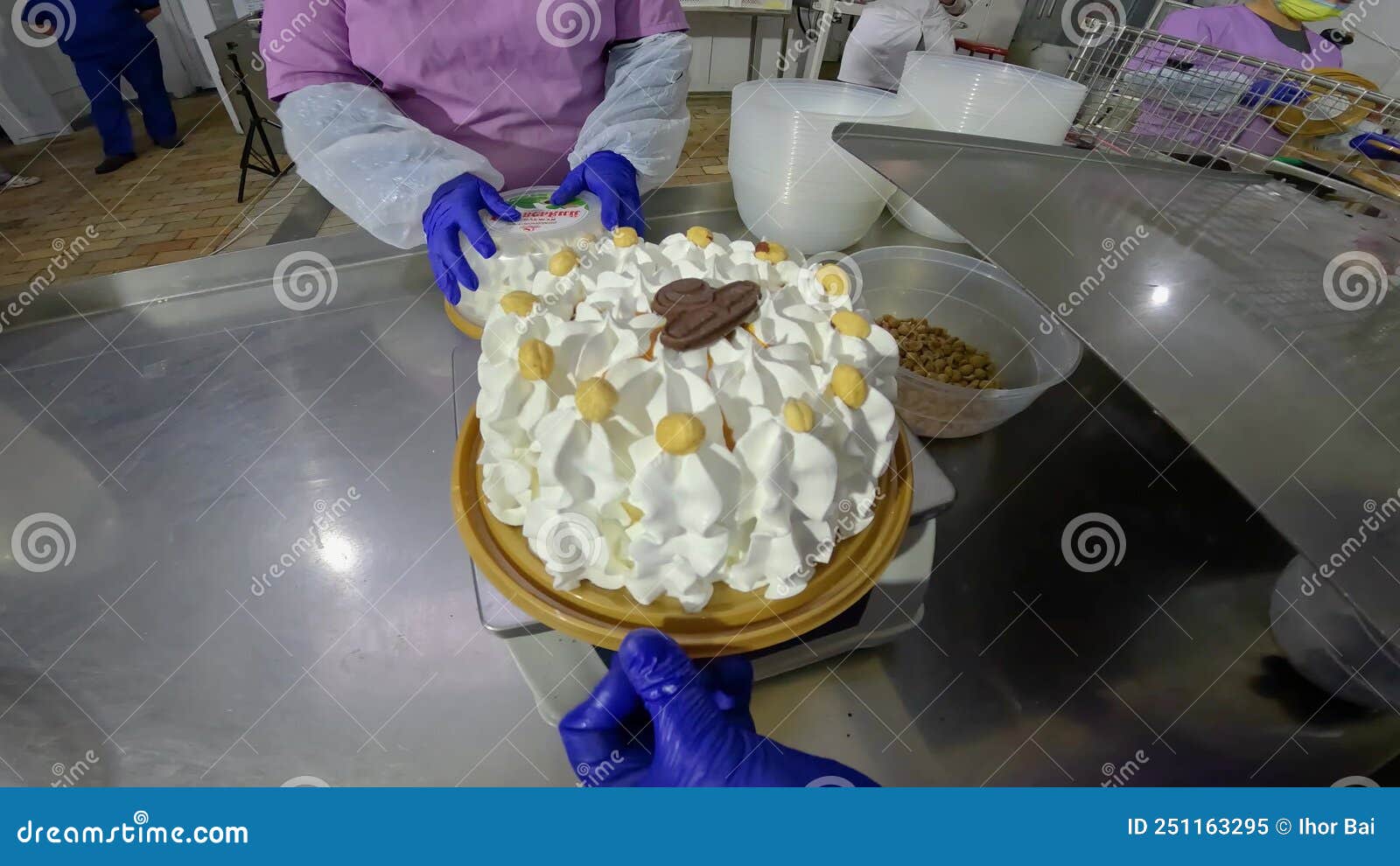 The Final Step in Making the Cake. Completion of the Cake at the ...