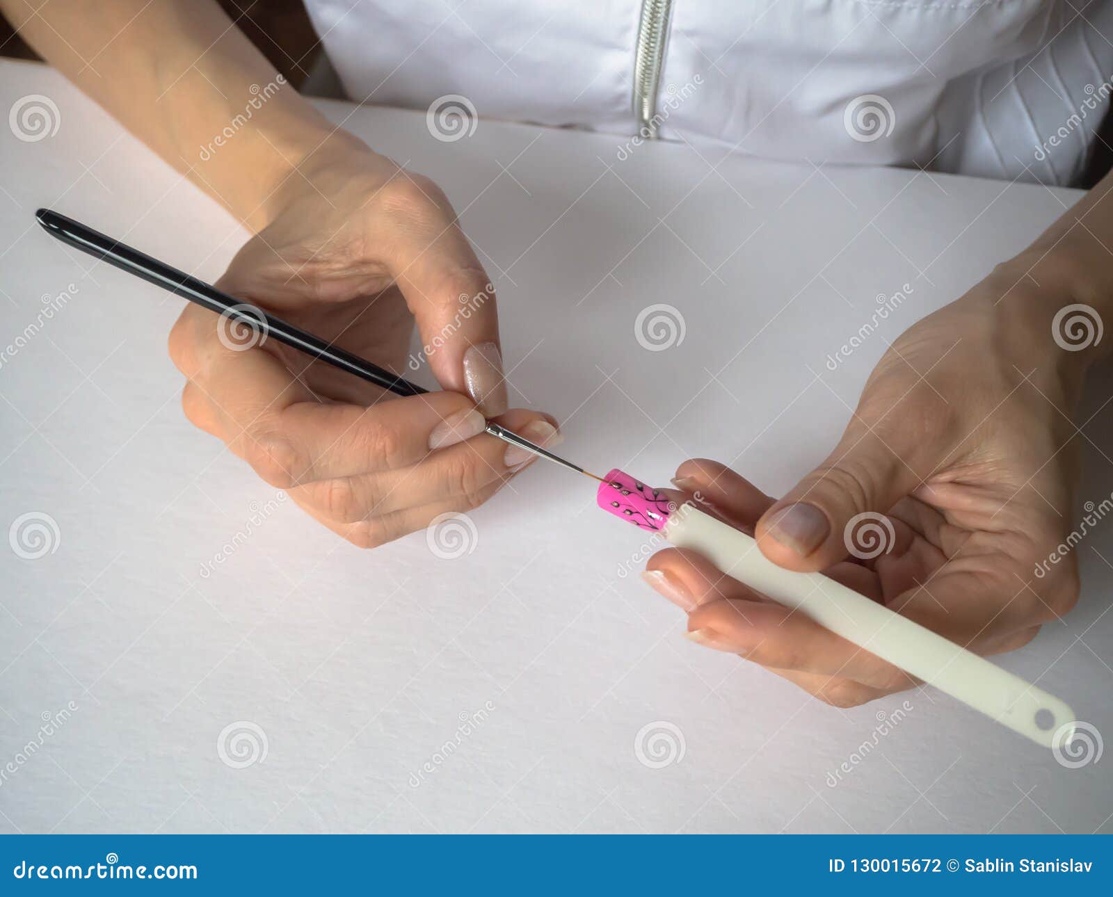 The Process of Creating a Drawing on Tips. Nail Art Design. Stock Photo ...