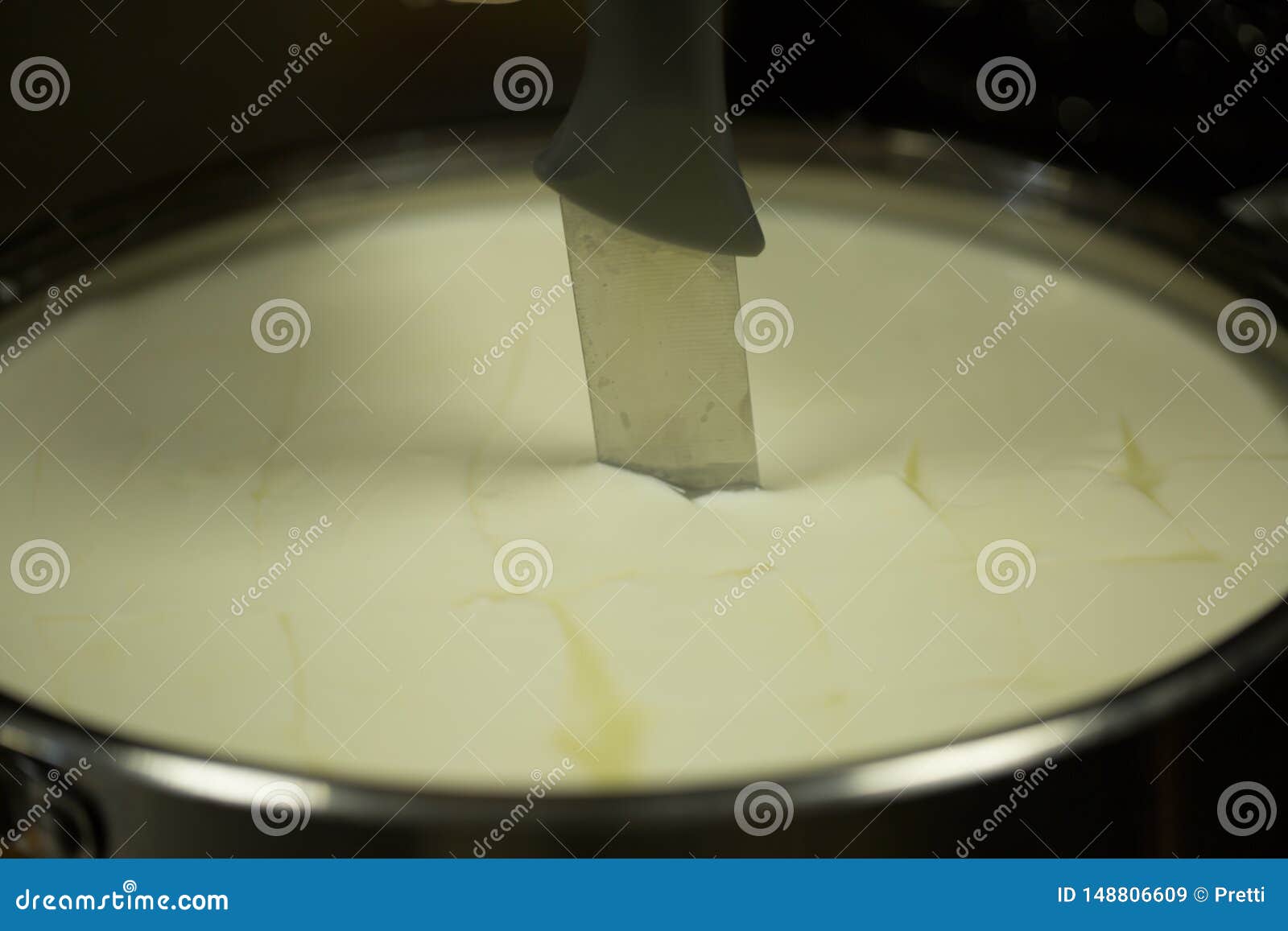 The Process of Creating a Grain of Cheese. Cooking Homemade Cheese ...