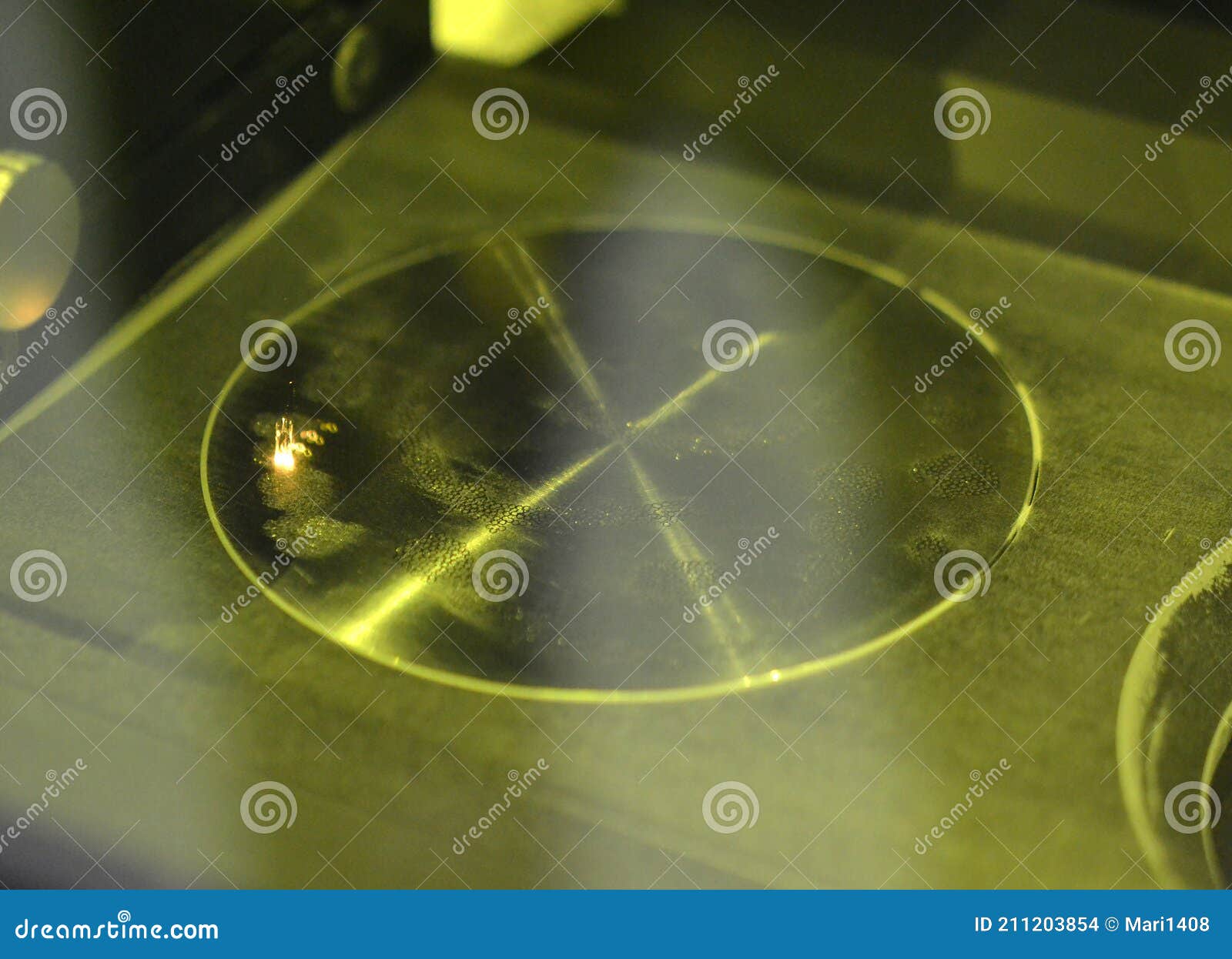 The Process of Creating a Metal Object with a Laser. Stock Photo ...