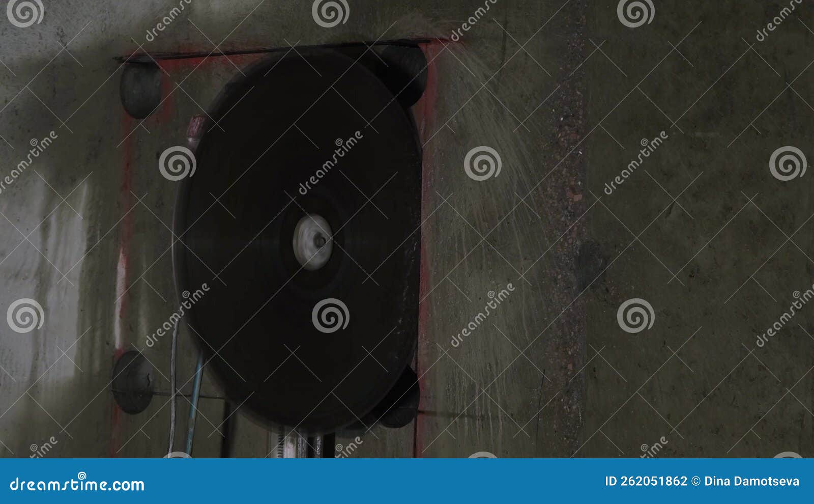The Process of Cutting a Concrete Wall. the Round Disc Cuts Concrete ...