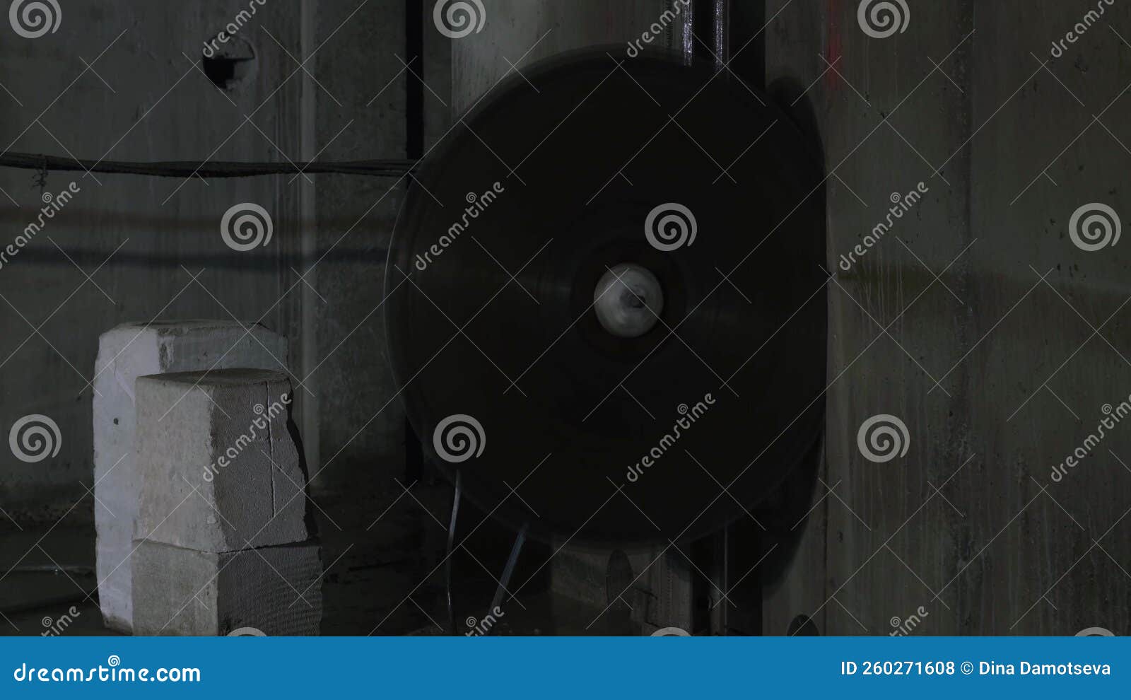 The Process of Cutting a Concrete Wall. the Round Disc Cuts Concrete ...