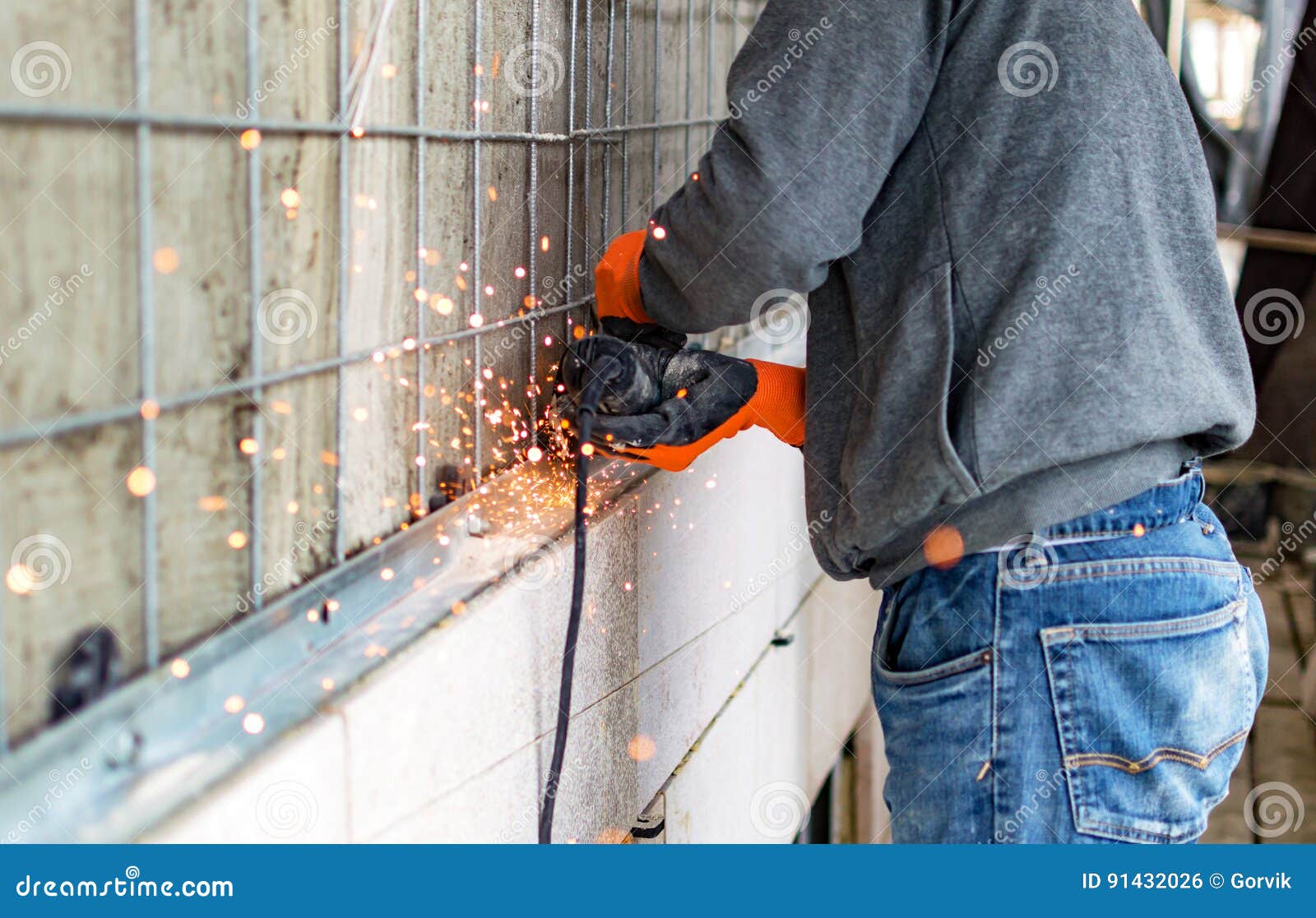The Process of Cutting Metal Angles Using Angle Grinder Stock Photo ...