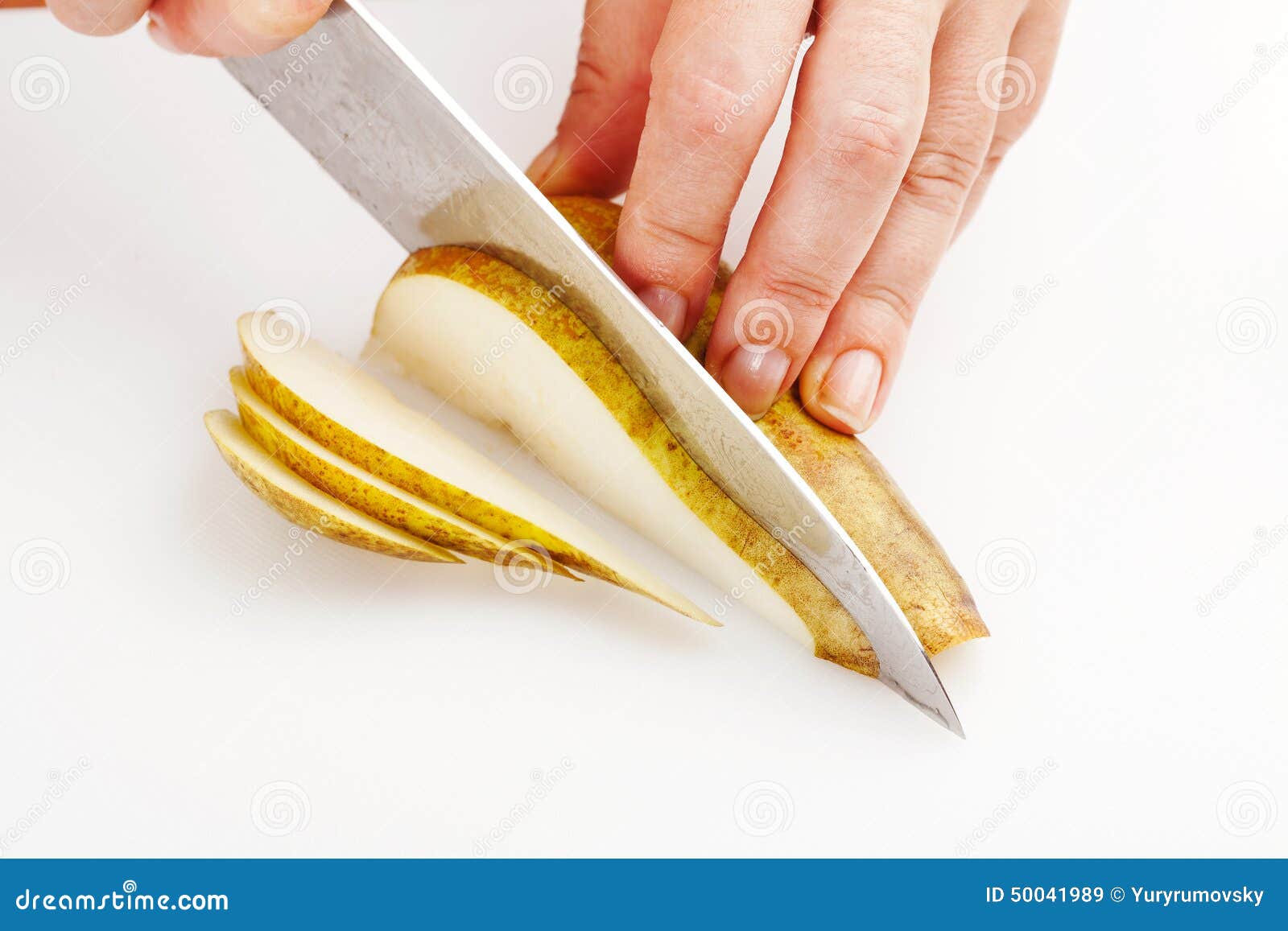 Process of cutting a pear stock image. Image of cutting - 50041989