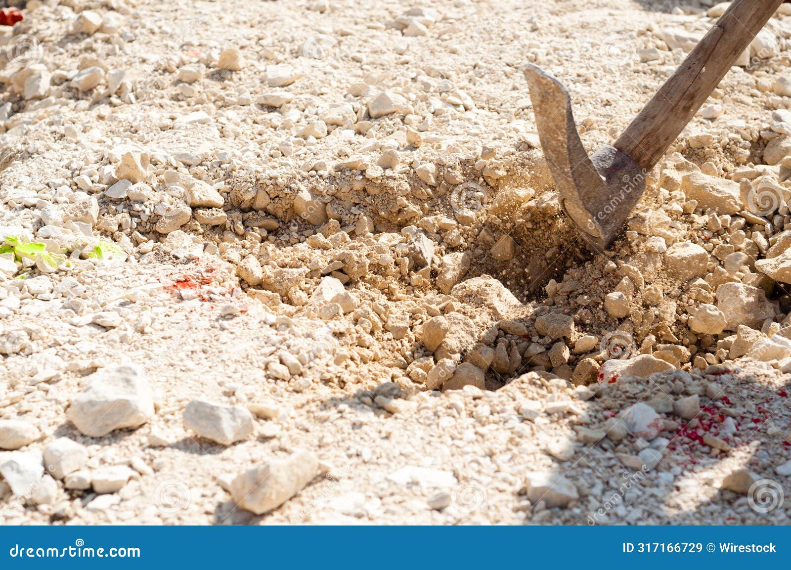 Process of Digging in Crushed Stone on a Construction Site in Germany ...
