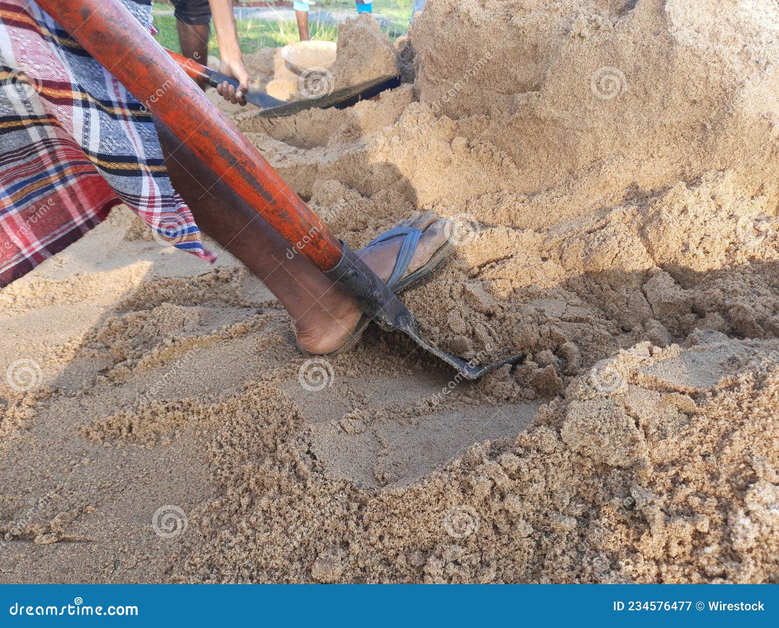 Process of Digging Sand with a Shovel on a Sunny Day Stock Image ...