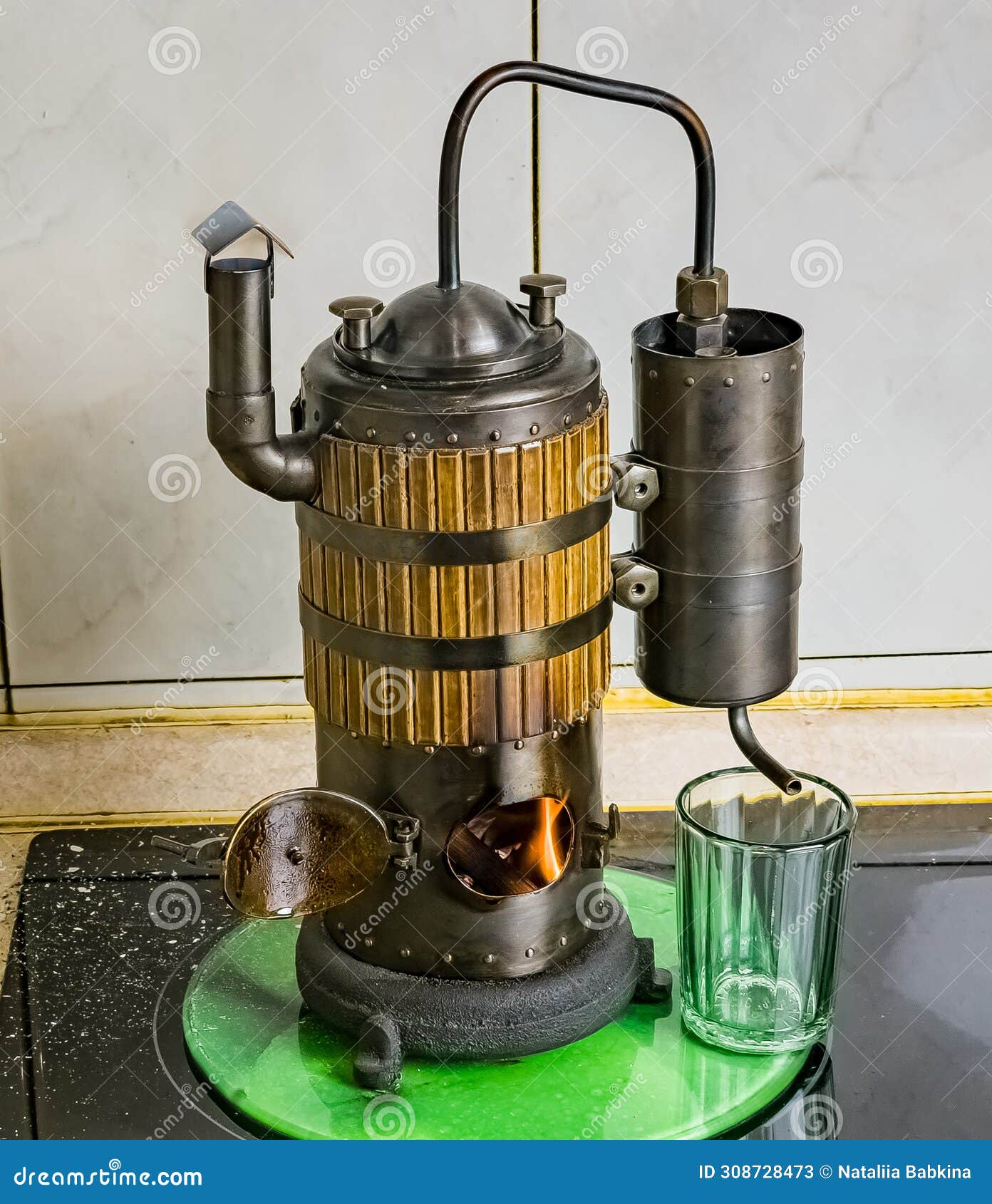 The Process of Distilling Wine at a Mini Distillery Using Wood. Volume ...