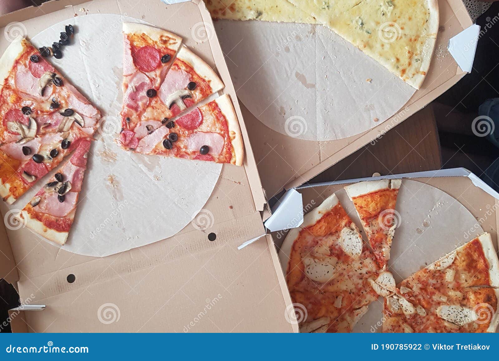 The Process of Eating Pizza, Leftover Pizza in a Portable Box Stock ...