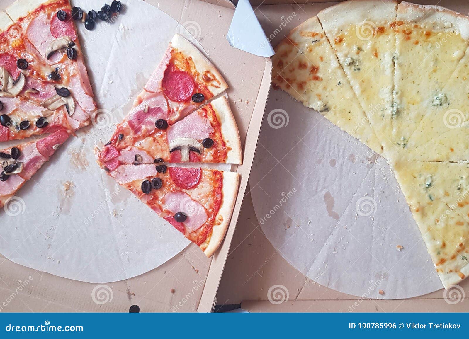 The Process of Eating Pizza, Leftover Pizza in a Portable Box Stock ...