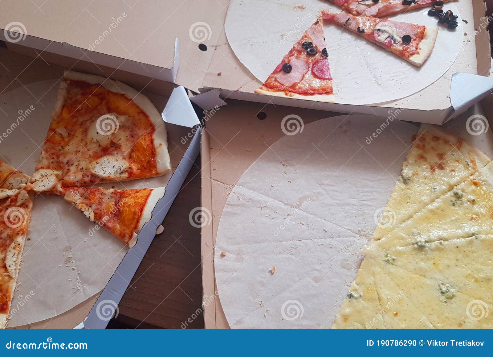 The Process of Eating Pizza, Leftover Pizza in a Portable Box Stock ...