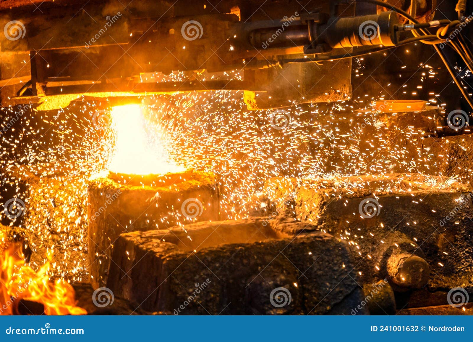 The Process of Filling Liquid Metal with Steel Molds Stock Photo ...