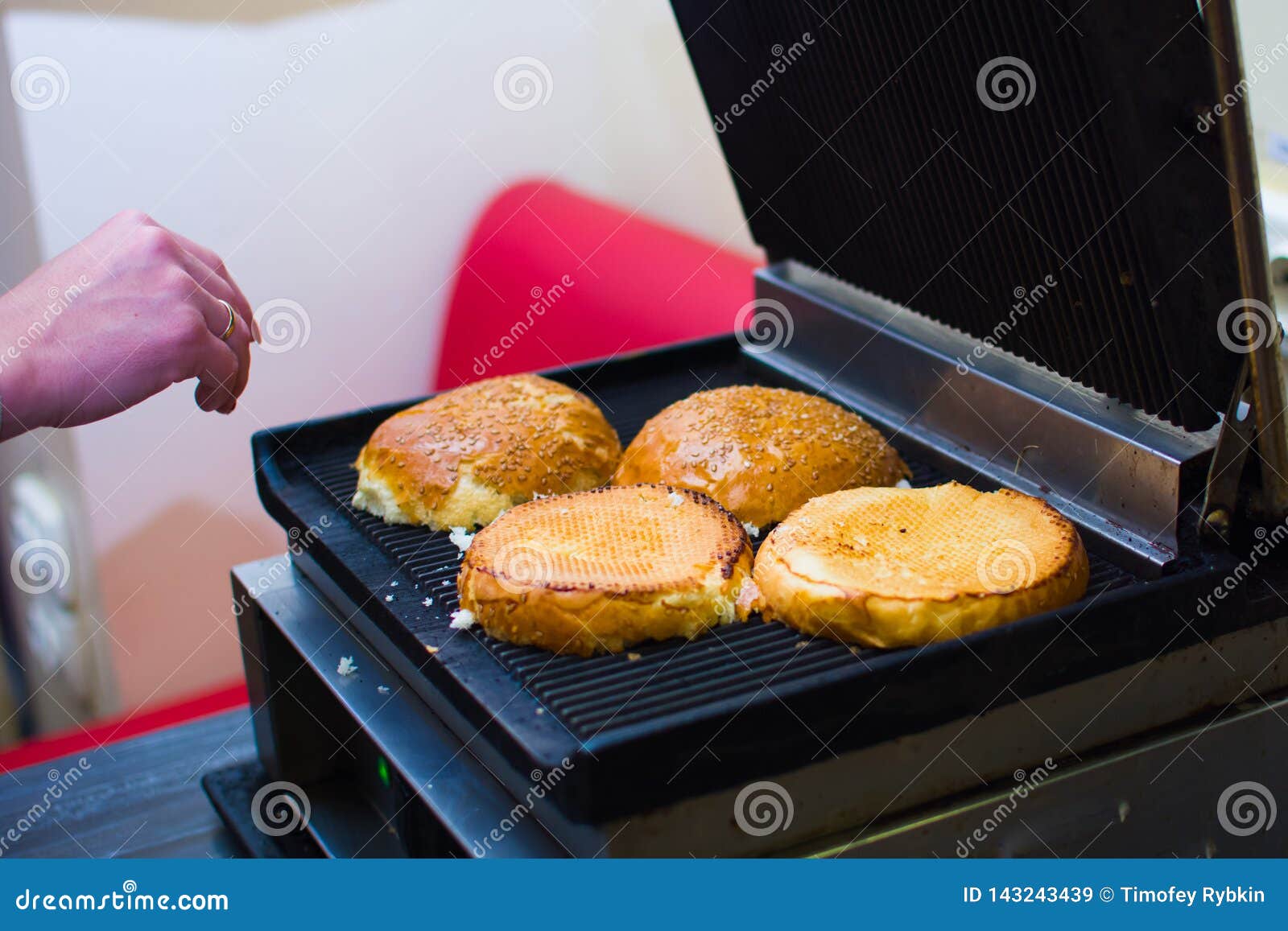 The Process of Frying Buns on an Electric Grill Stock Image - Image of ...