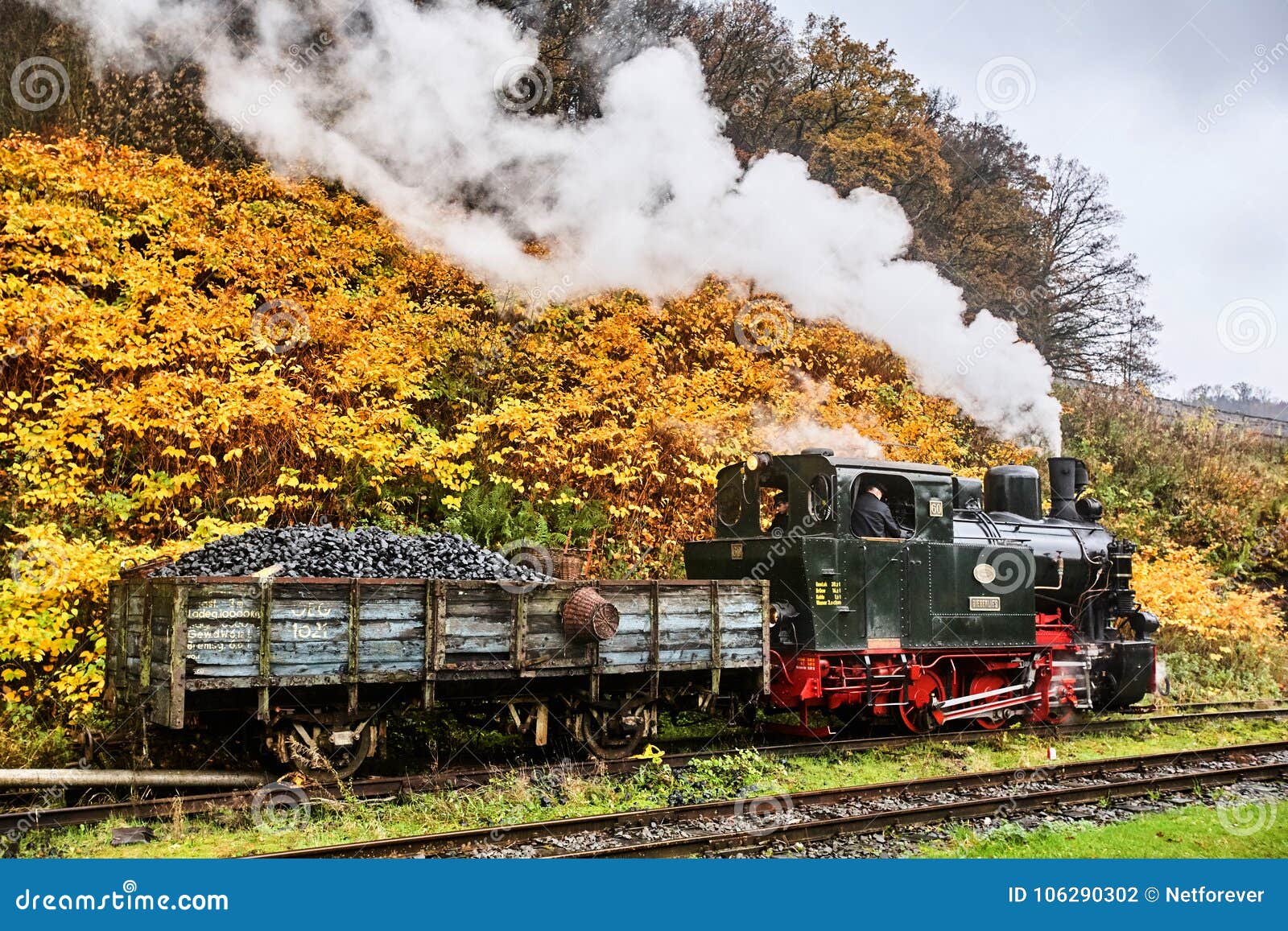 Fueling a steam train editorial photography. Image of railway - 106290302